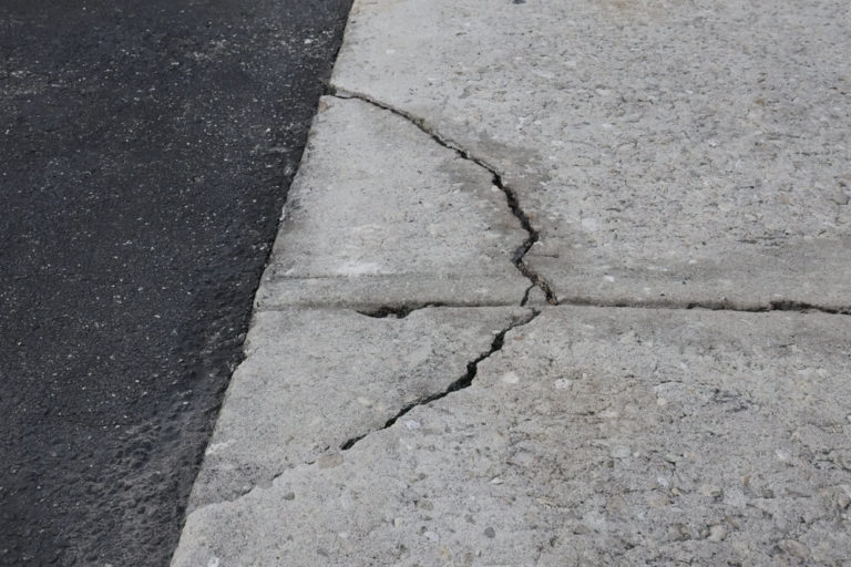 What Is Street Creep? (How It Damages Your Driveway and Foundation)